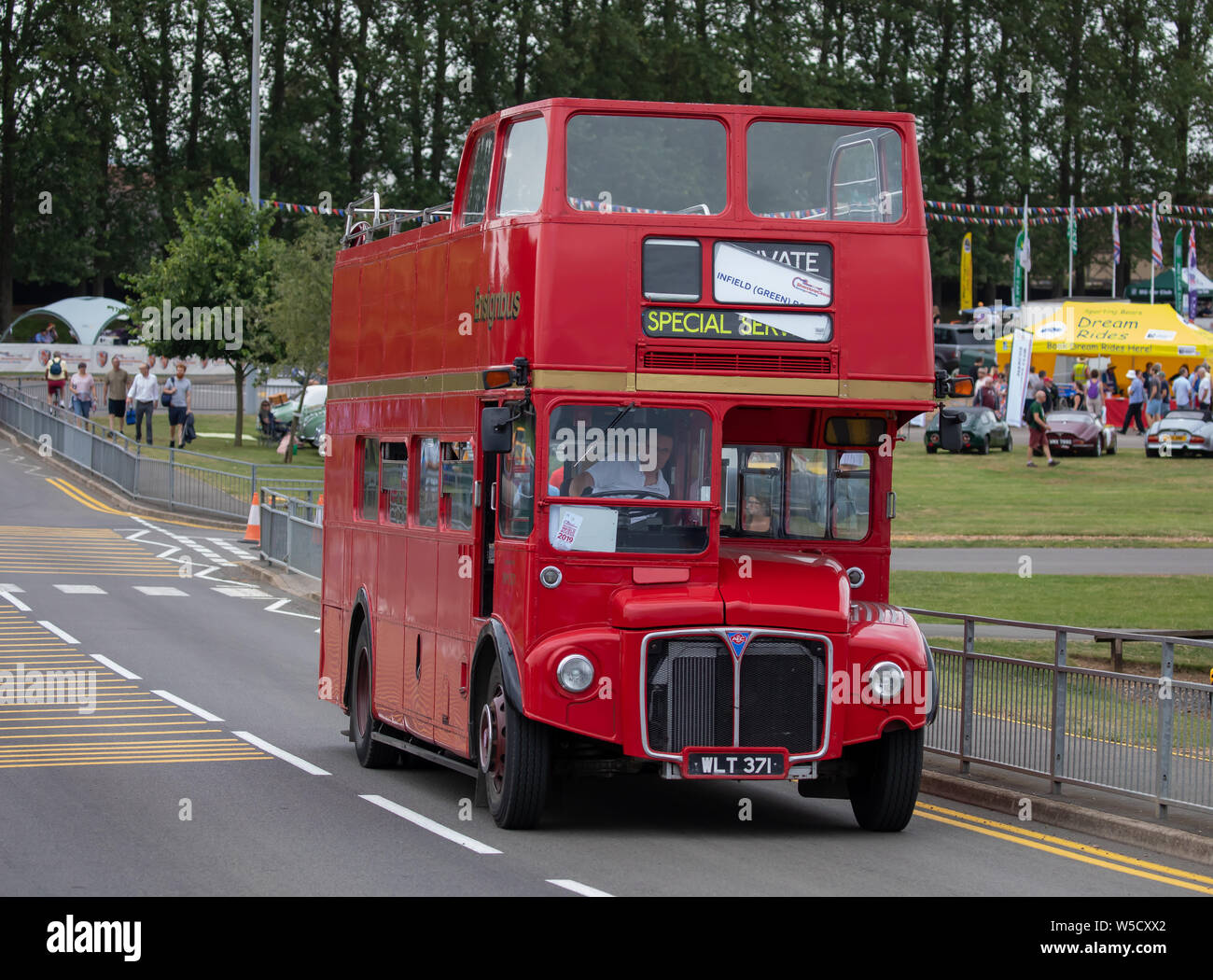 Red double decker bus at Silverstone Classic Stock Photo - Alamy