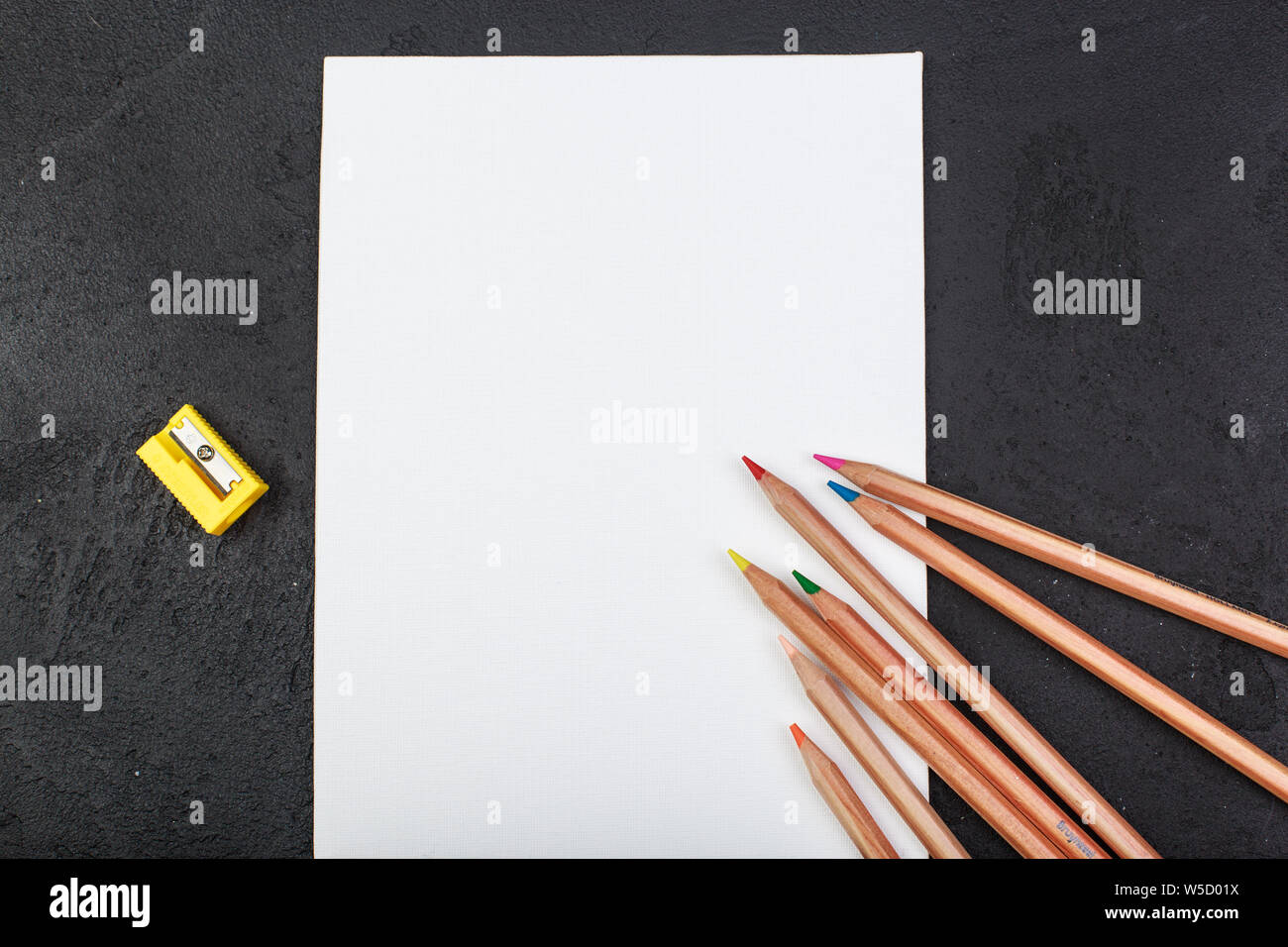 Blank paper and colorful pencils top view from above Stock Photo - Alamy