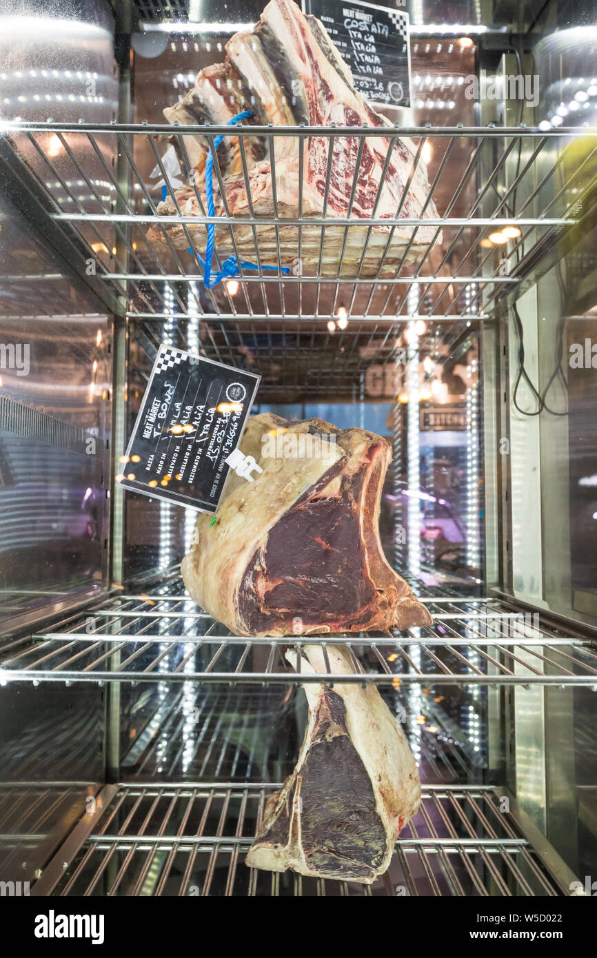 Display of Dry Aged Meat Steaks in butchers shop or restaurant in an ...