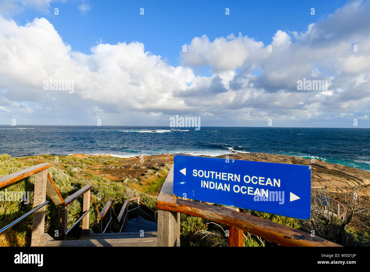 Cape Leeuwin sunset with blue sky and clouds looking out to where the ...