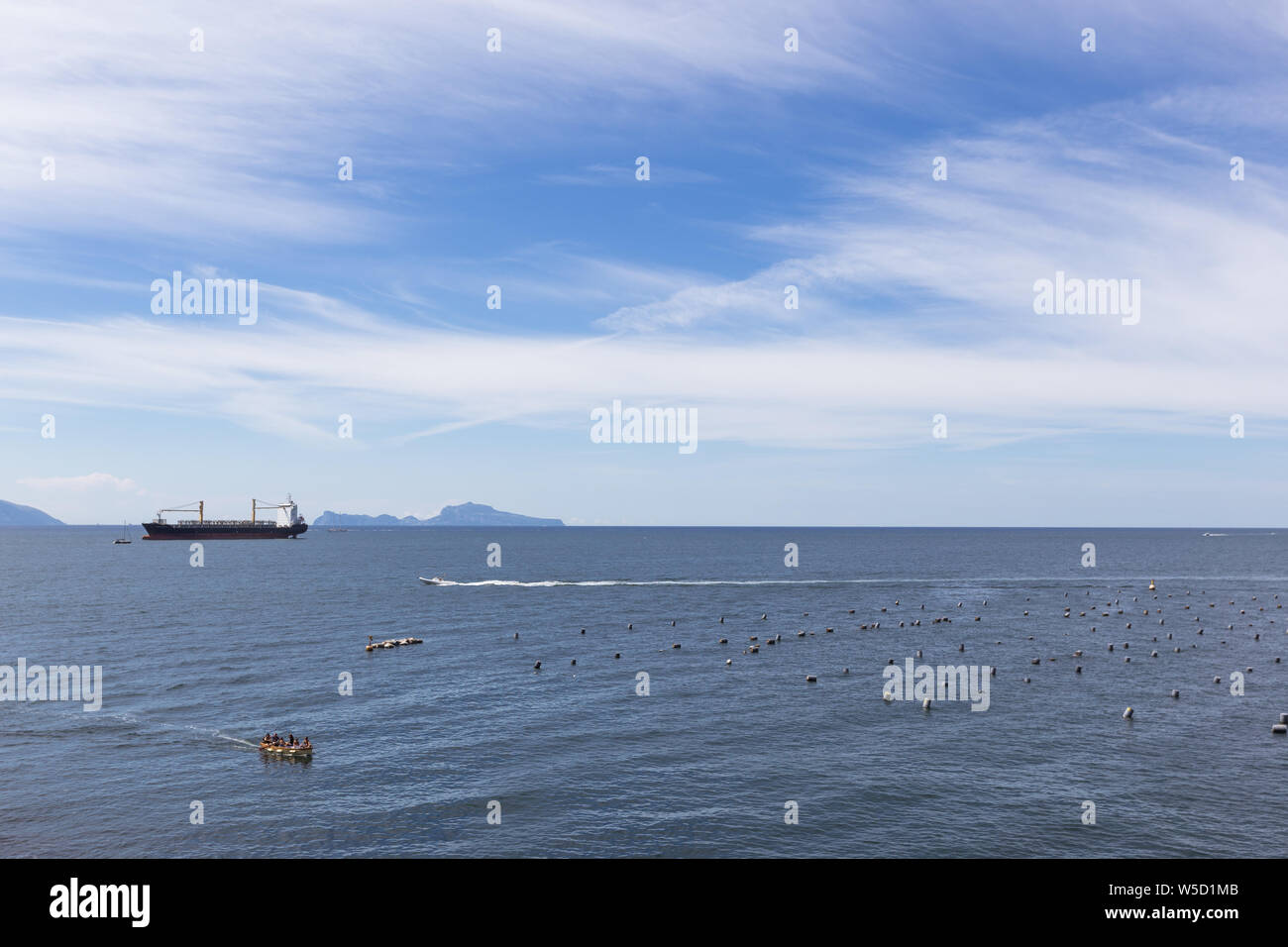 Empty container cargo ship in the blue sea. Aerial view Stock Photo - Alamy