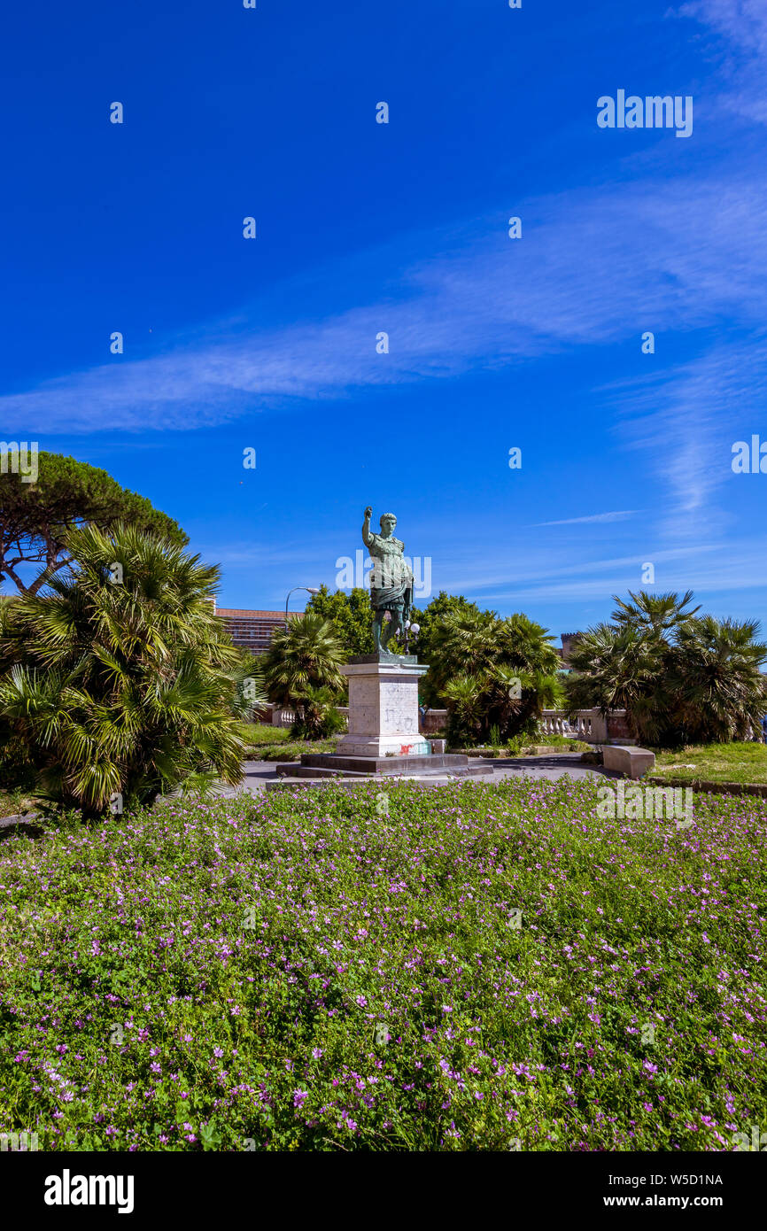 Ancient statue of Julius Caesar in a green park in Naples near the ...