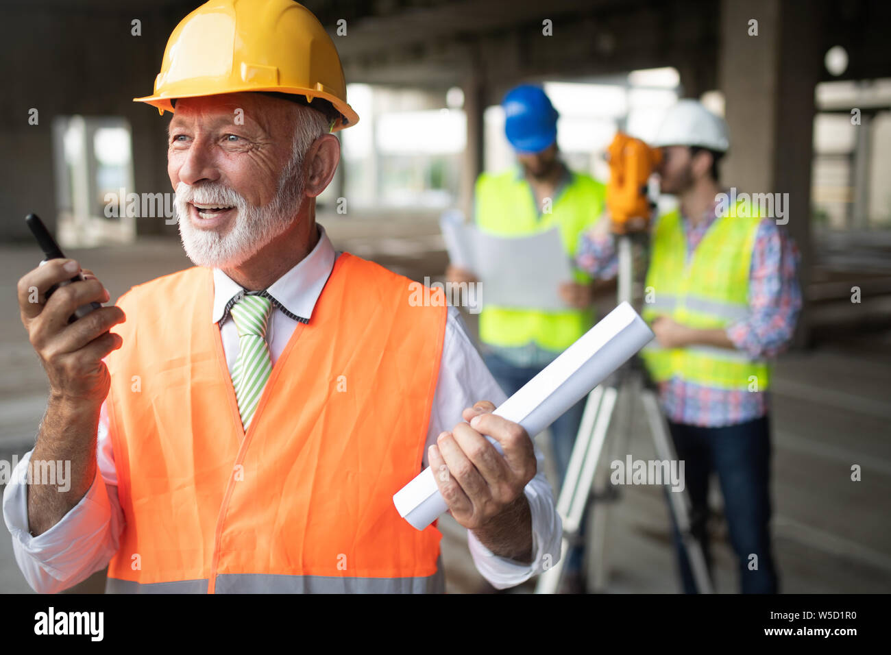 Group of construction engineer working in construction site Stock Photo ...