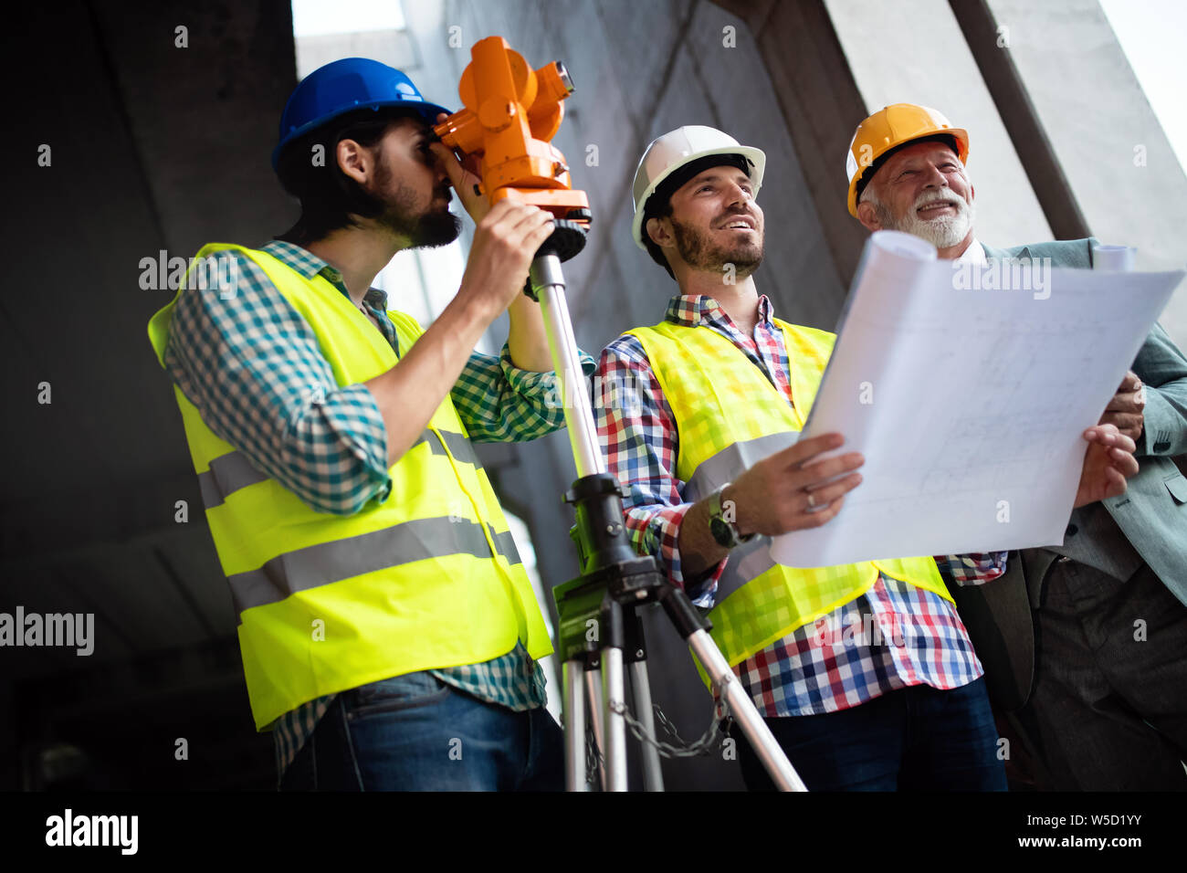 Group of construction engineer working in construction site Stock Photo ...