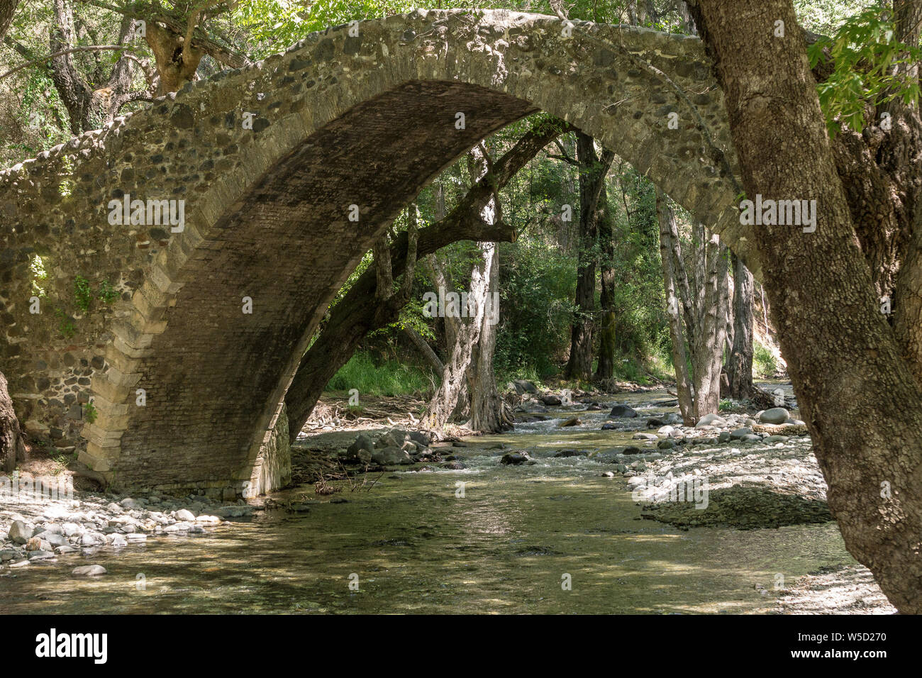 the Venetian stone bridge of Tzelefos in Cyprus with creek Stock Photo ...