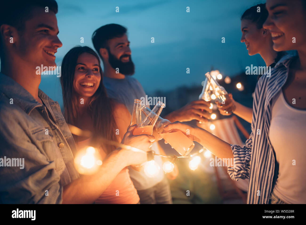 Female party night lights hi-res stock photography and images - Alamy