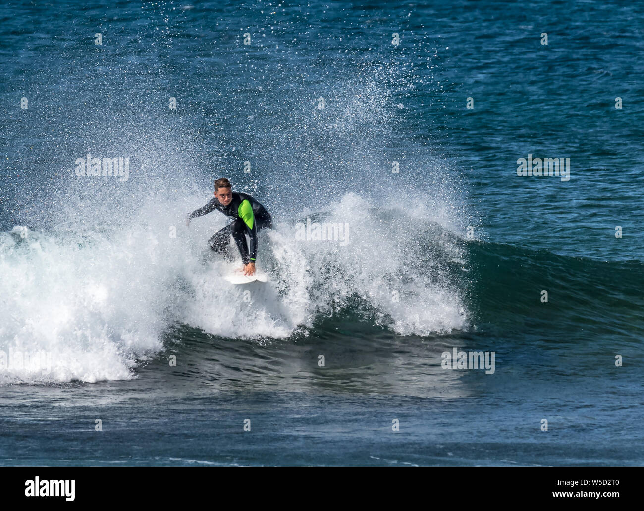 Short Board Surfing, Playa de las Americas Stock Photo - Alamy