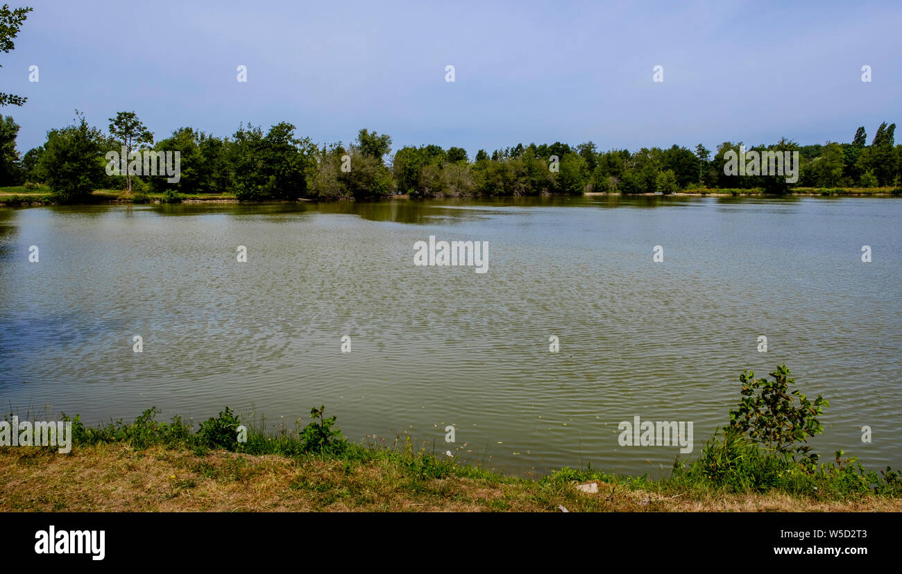 A fishing lake at Cintray, Normandy, France Stock Photo - Alamy