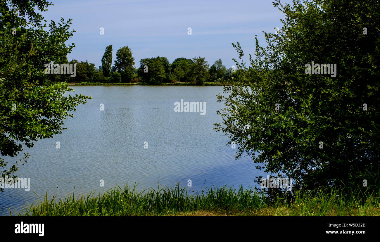 A fishing lake at Cintray, Normandy, France Stock Photo - Alamy