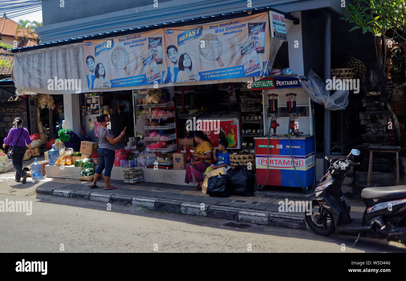 Shop with petrol pumps for local motorcycle traffic, Ubud, Indonesia ...