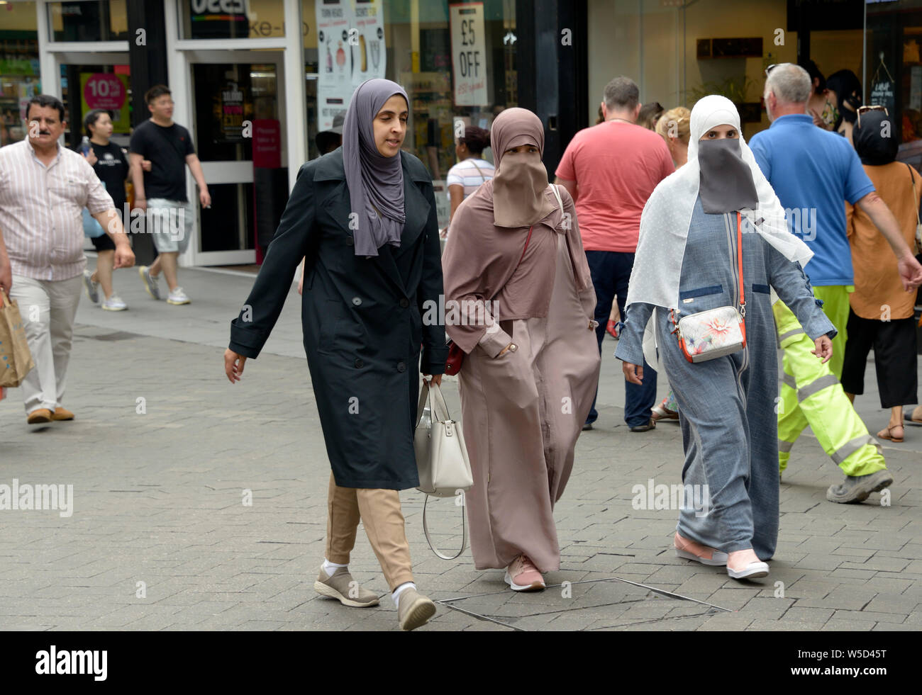 Three Muslim women, two with Niqab, in street, in Nottingham Stock ...