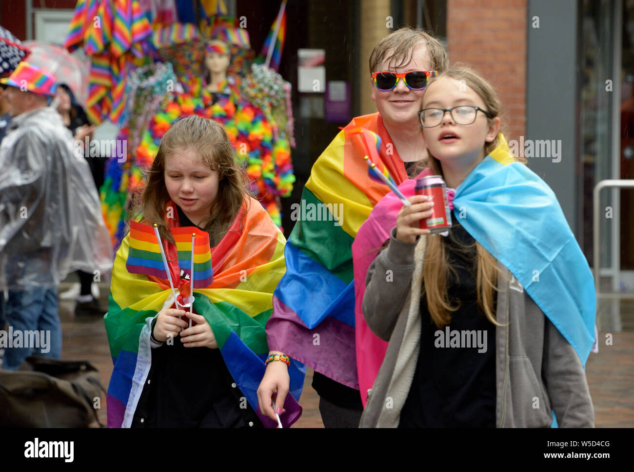 Three young people at Pride event in Nottingham Stock Photo - Alamy