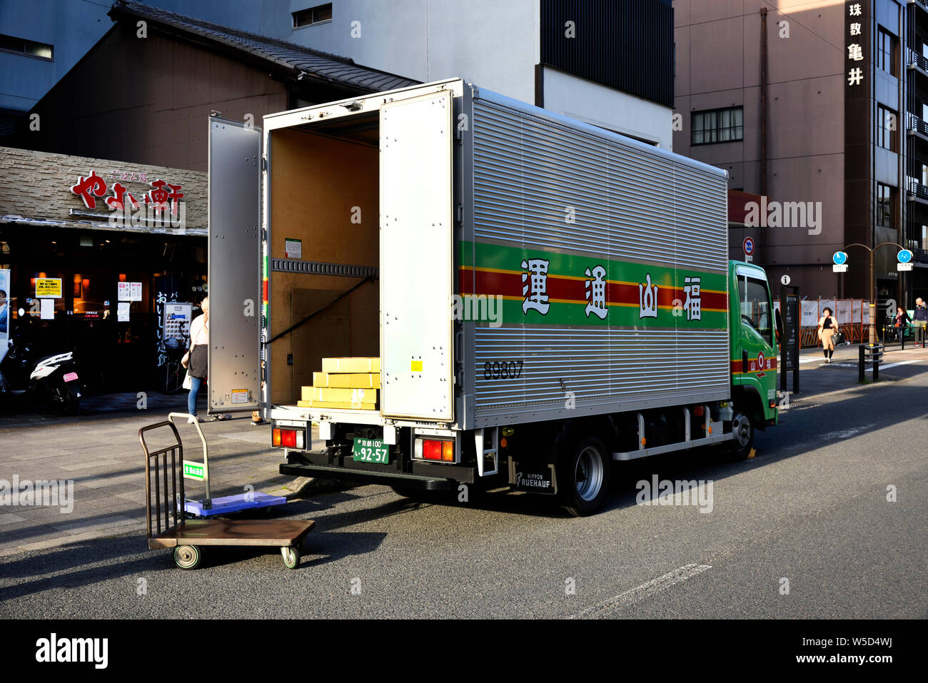 courier delivery van Japan Stock Photo - Alamy