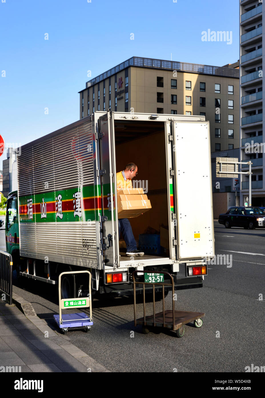 courier delivery van Japan Stock Photo - Alamy