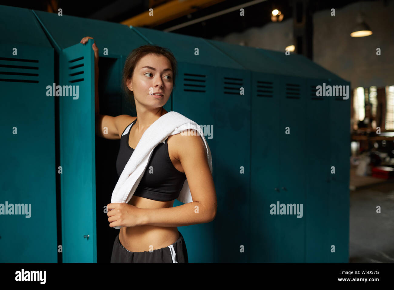 Changing clothes woman locker room hi-res stock photography and images ...