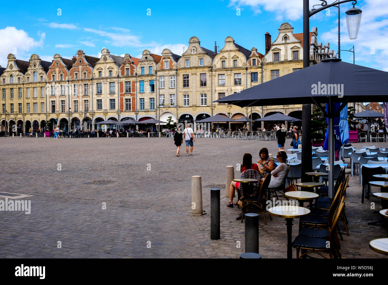 Cafes surround Heroes Square (Place des Héros) in the centre of Arras ...
