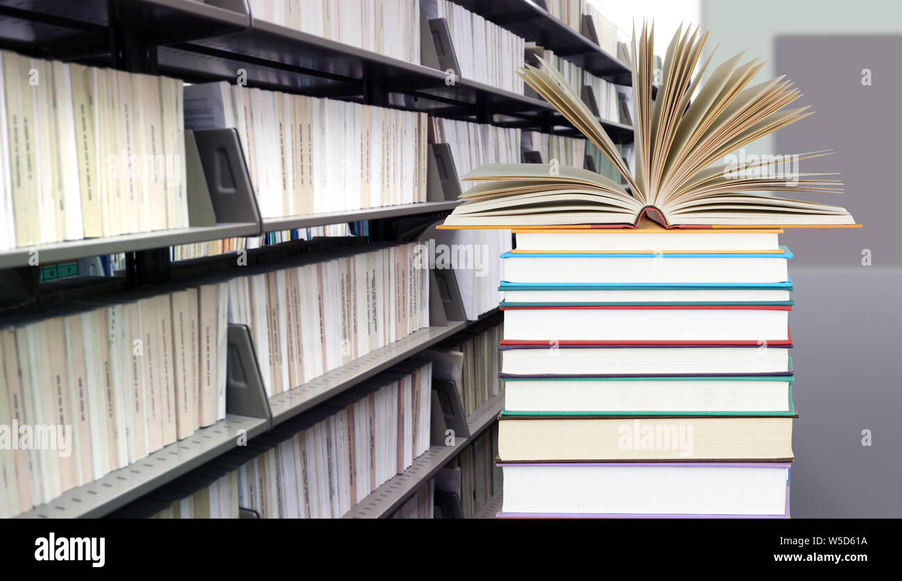 stack of books in library for education concept Stock Photo - Alamy