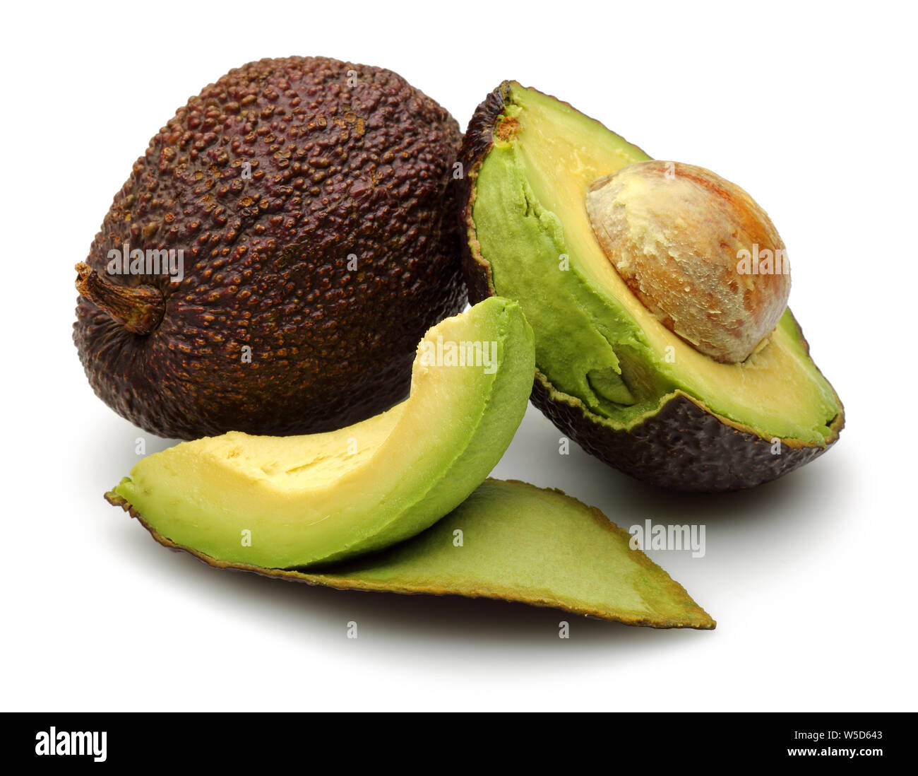 Sliced ripe avocados isolated on white background Stock Photo - Alamy