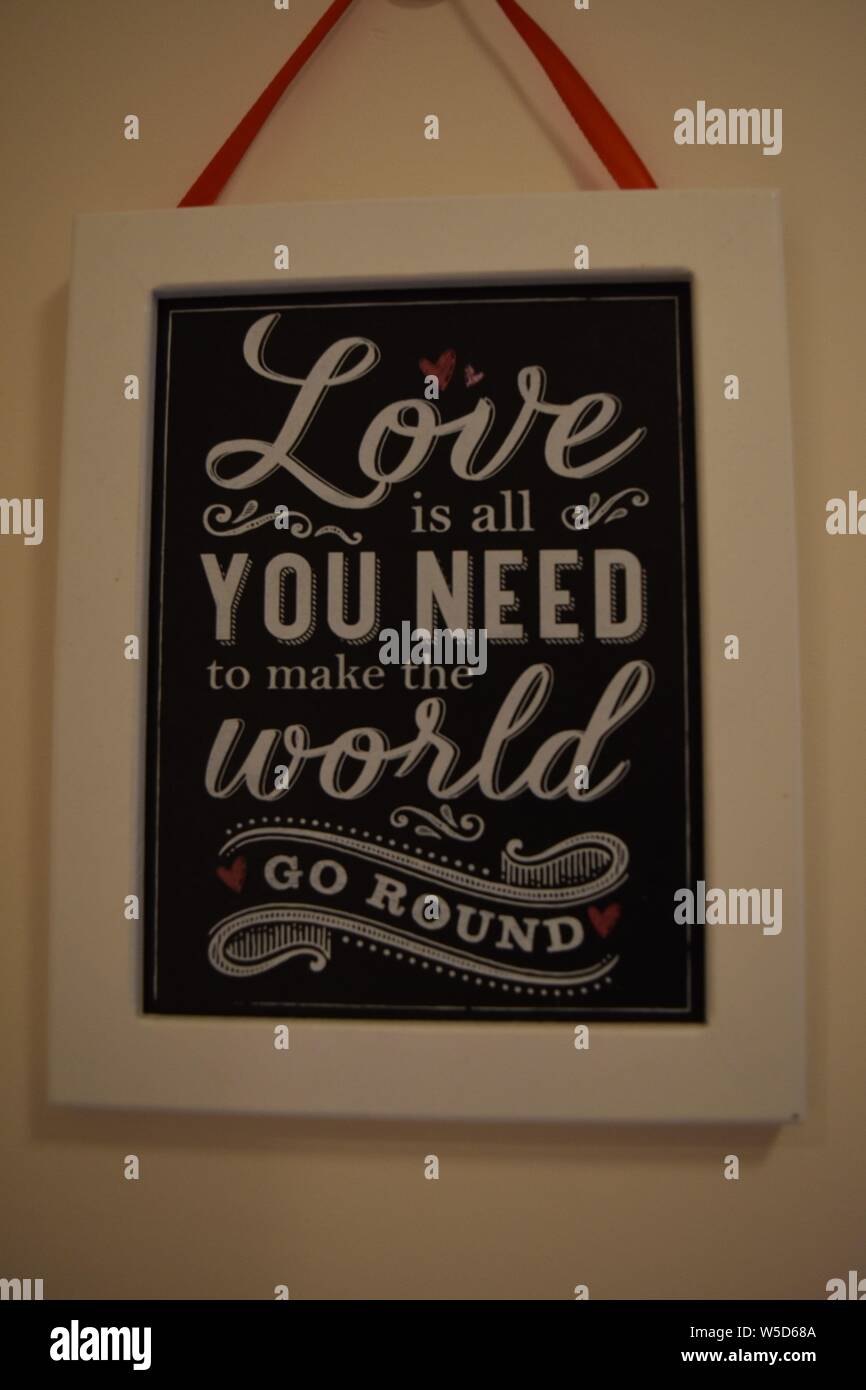Love is all you need to make the world go round Stock Photo - Alamy