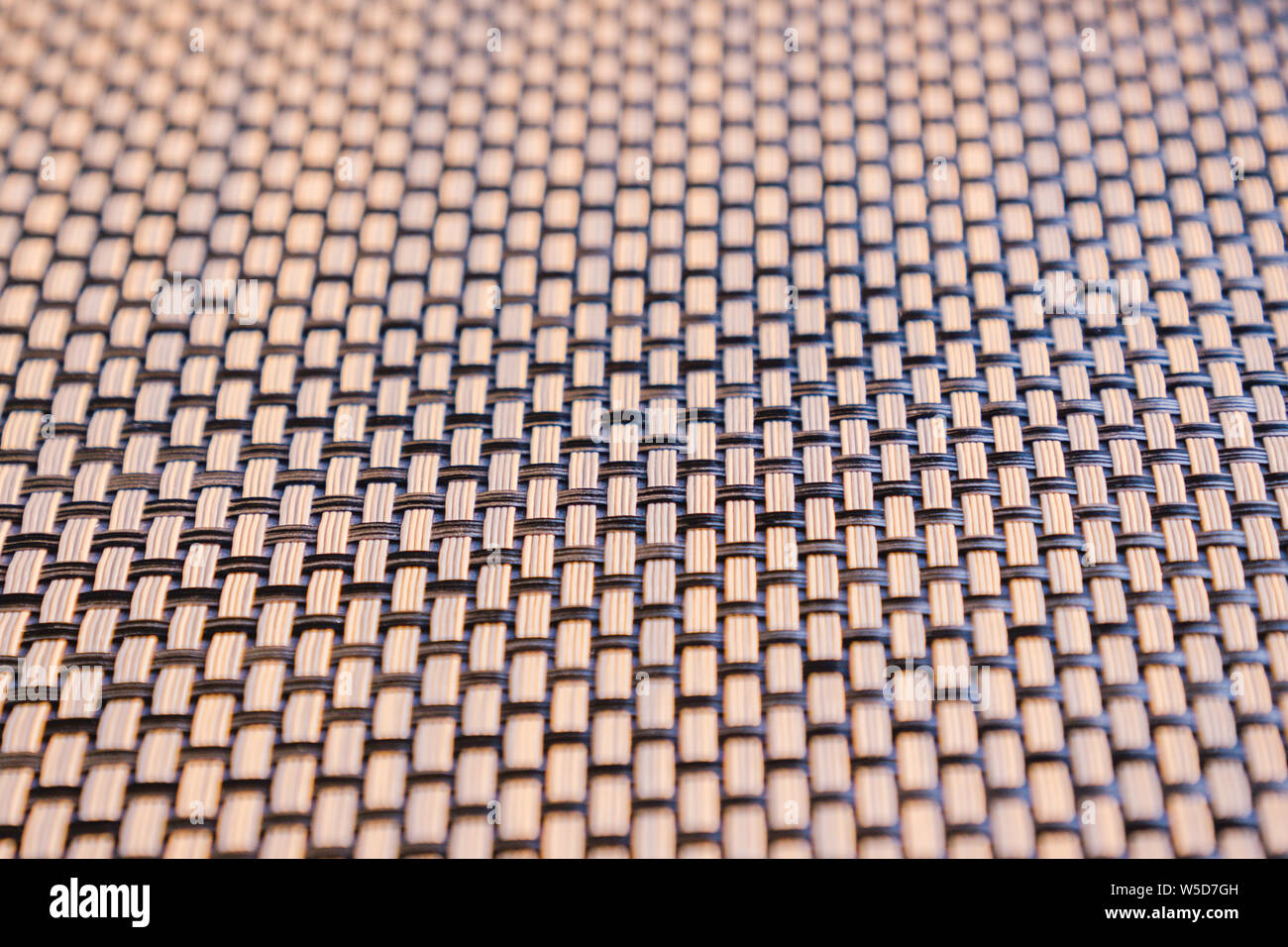 Dark and light brown woven bamboo strips pattern close up. Texture ...