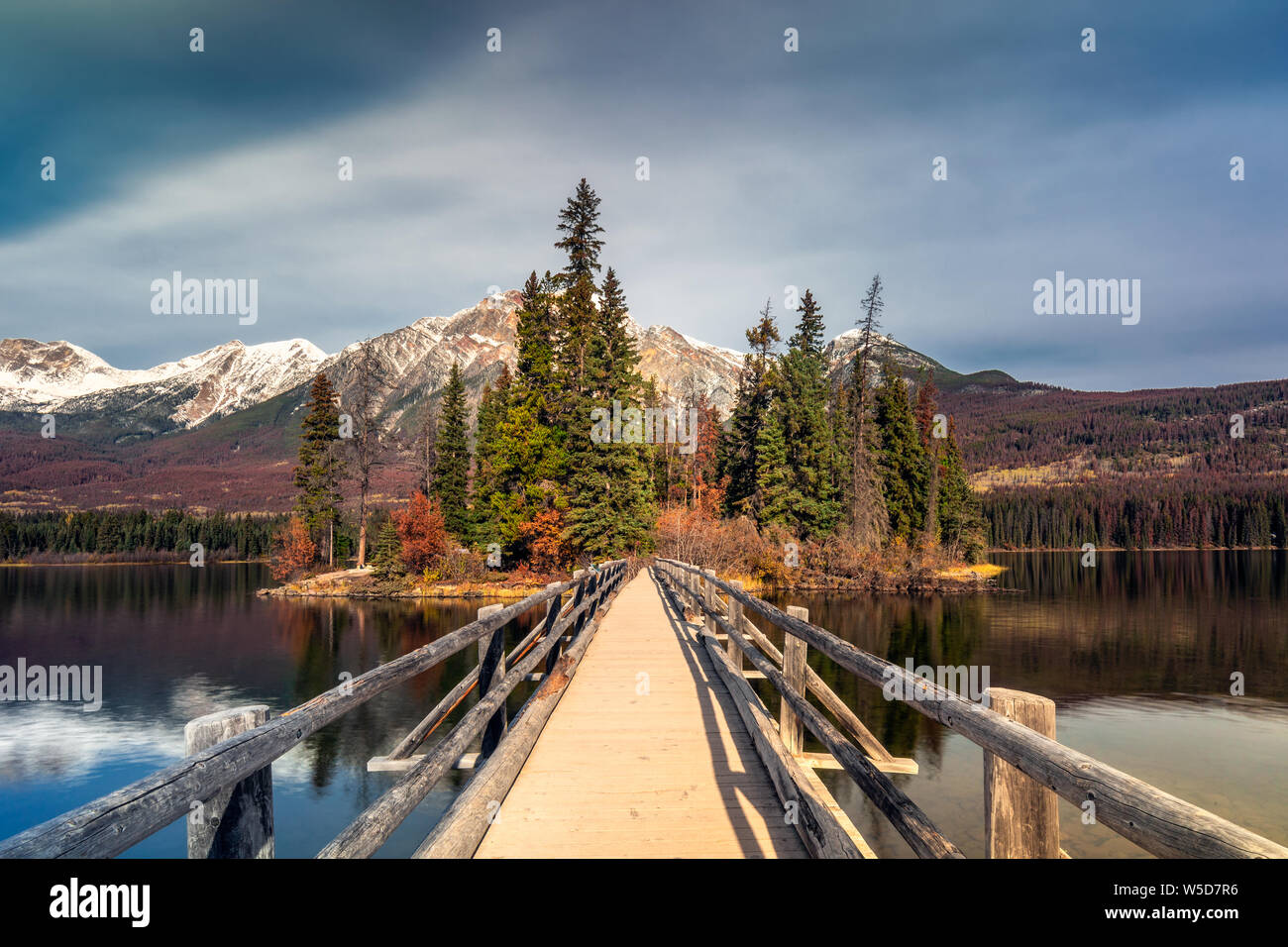 Bridge at Pyramid Lake with mountains reflection at Jasper National ...
