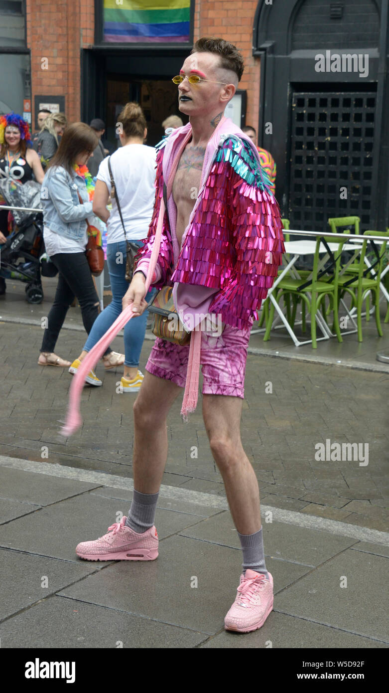 Guy in pink, acting for audience. gay, Pride Stock Photo - Alamy