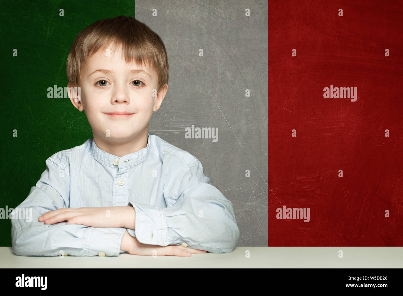 Thinking child boy student against the Italy flag background. Italian ...