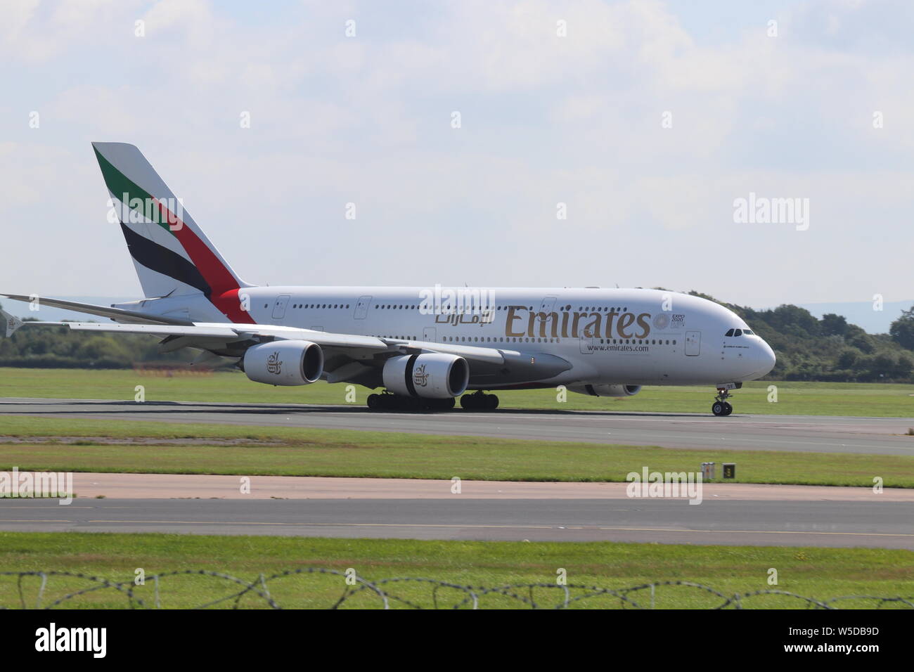 A Emirates airbus A380-800 landing at Manchester airport Stock Photo ...