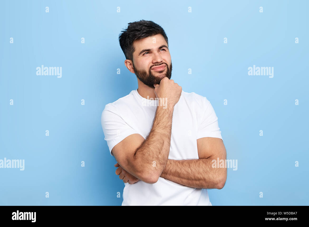 pensive thoughtful handsome man making up a plan, idea, puzzled guy ...