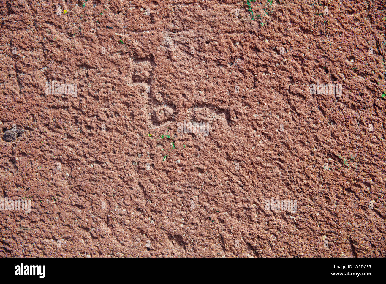 Detail of the texture of coarse red granular wall Stock Photo - Alamy