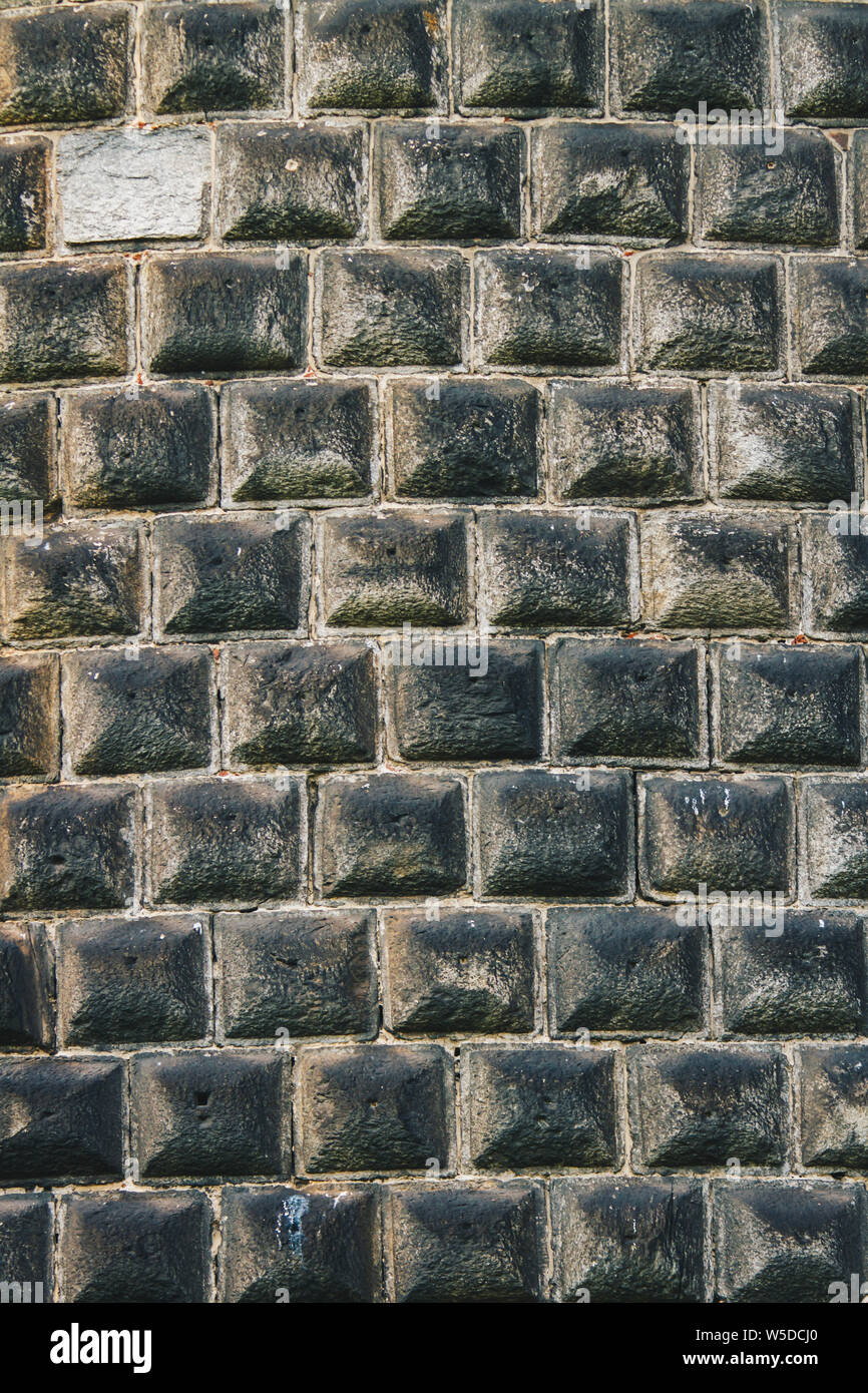 Closeup detail of the ashlar wall made of grey stone Stock Photo - Alamy