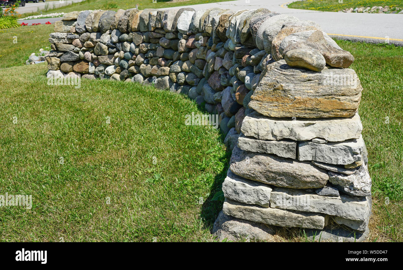 Dry Stone Wall or Gritstone wall or also know as dry stack as seen in ...