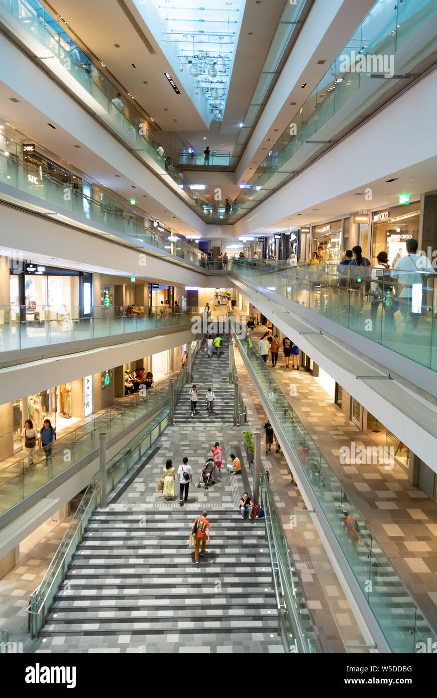 People visiting stores of Omotesando hills, shopping mall, tokyo, japan ...