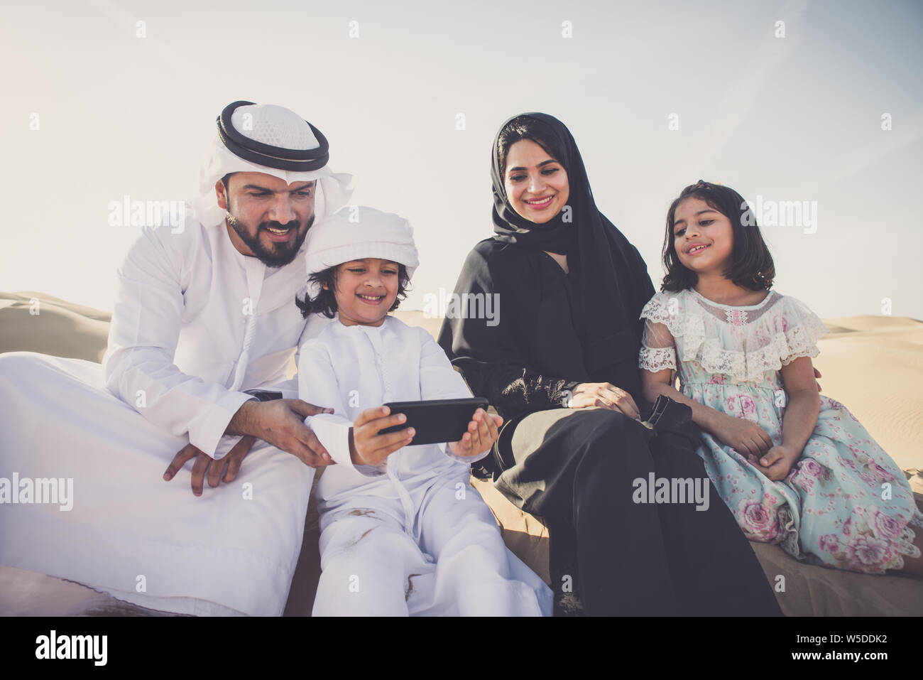 Portrait arab family sitting in hi-res stock photography and images - Alamy