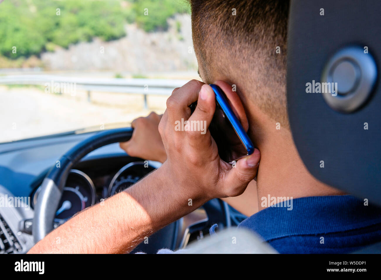 Dangerous multitasking hi-res stock photography and images - Alamy