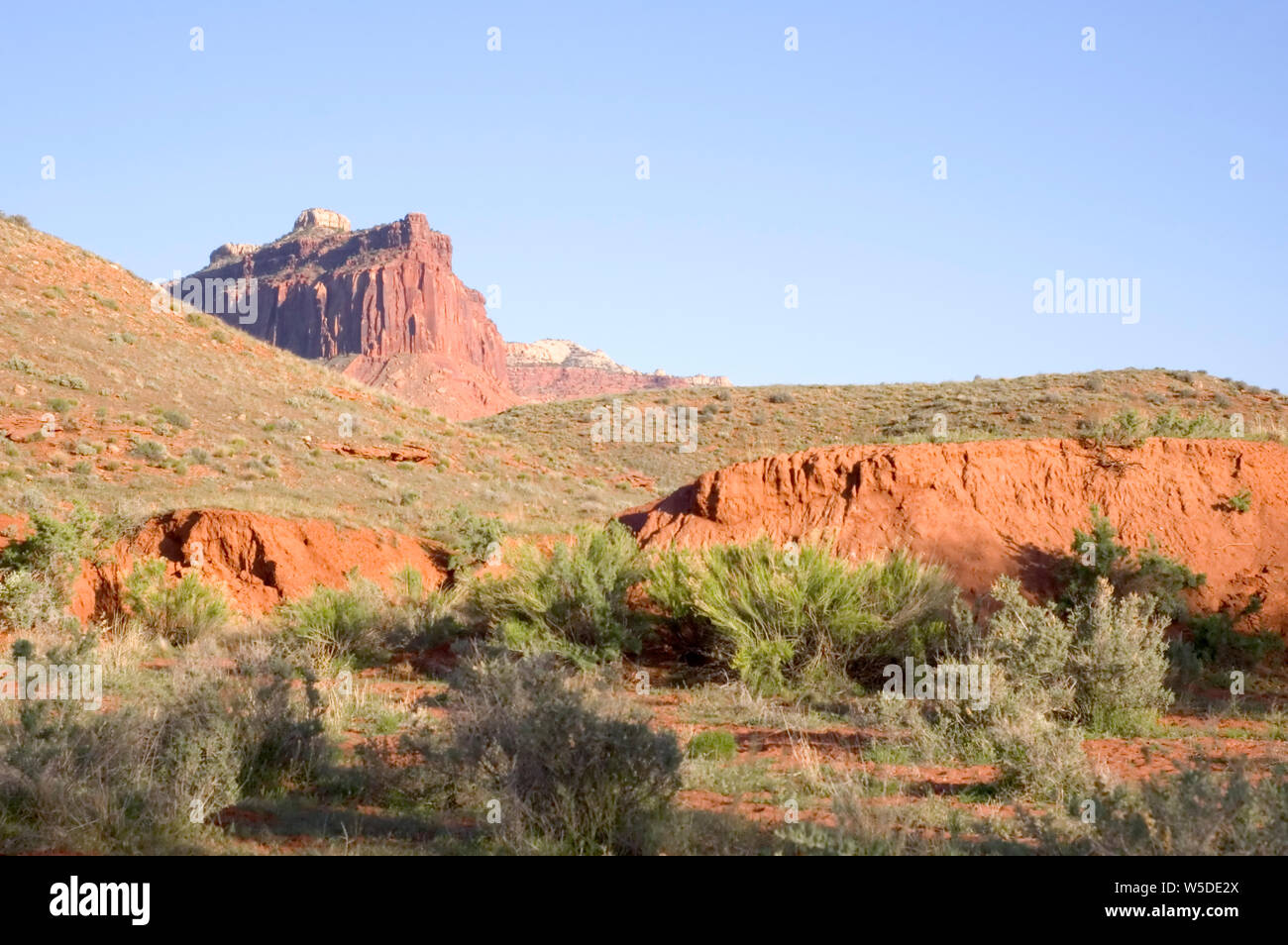 Red slickrock formations along the highway going into Canyonlands ...