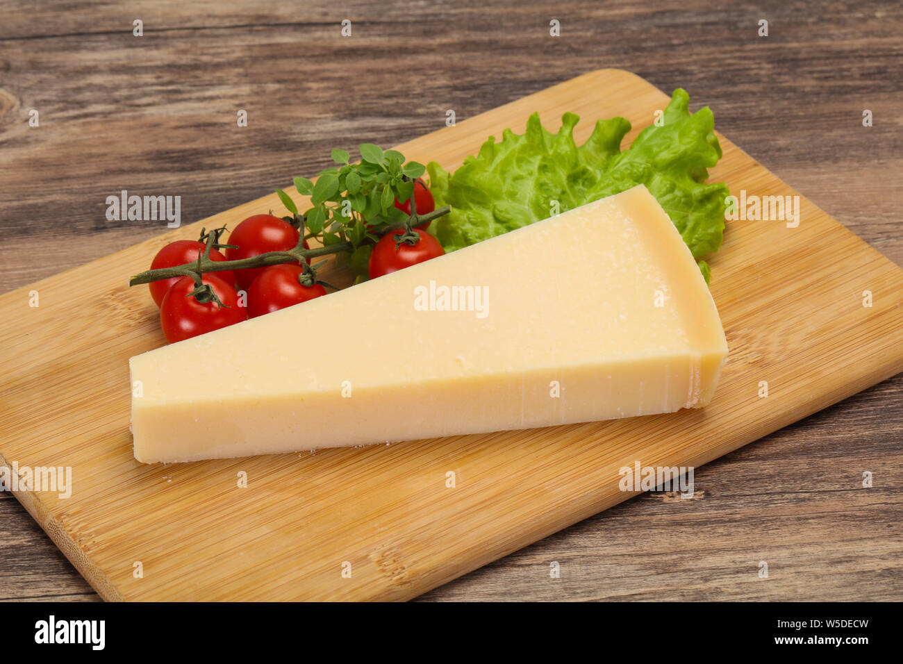Italian traditional parmesan cheese triangle served salad Stock Photo ...