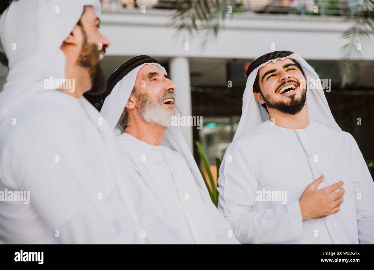 Three emirati men in traditional hi-res stock photography and images ...