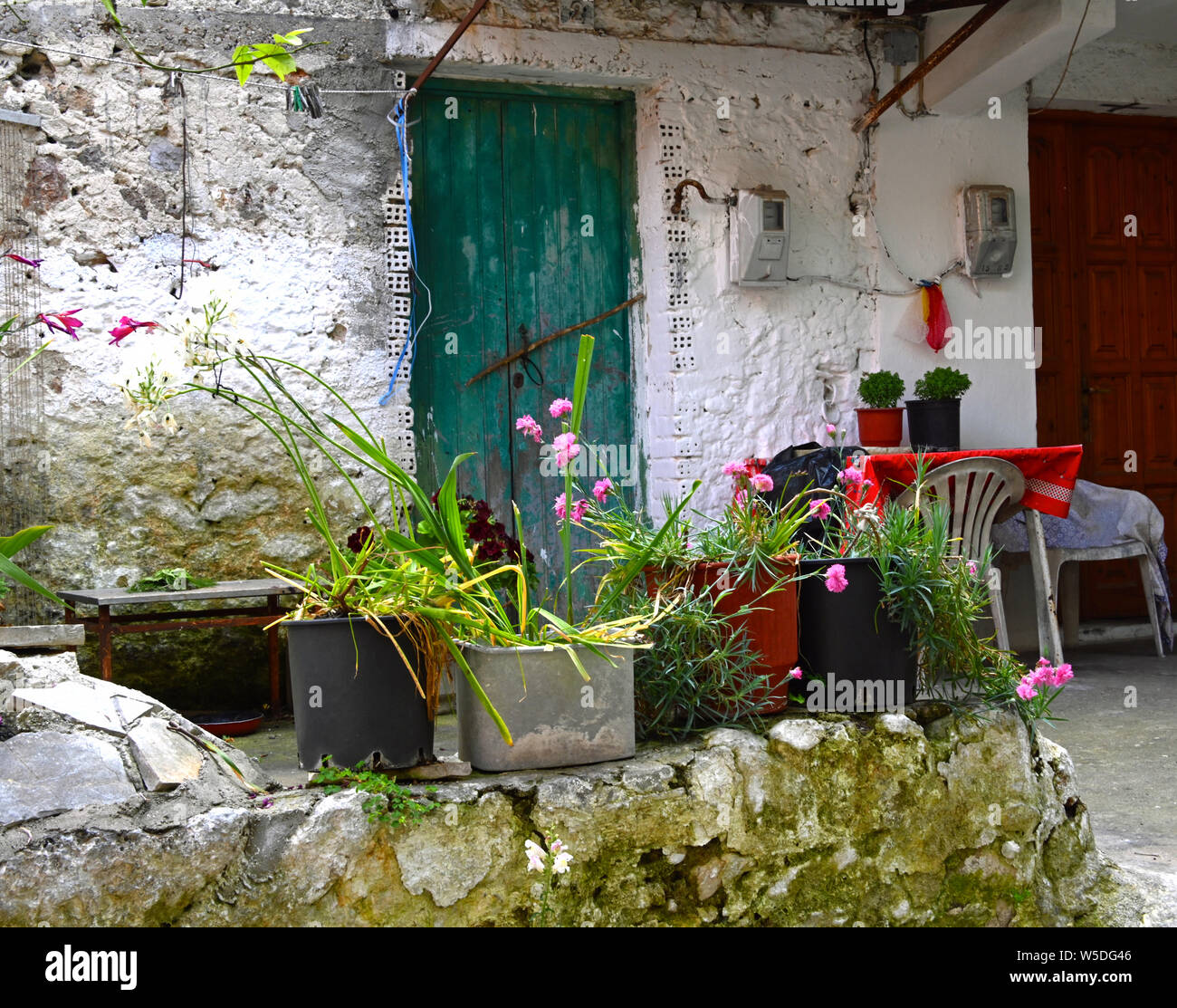 Simple stone cottage in Corfu village Stock Photo - Alamy