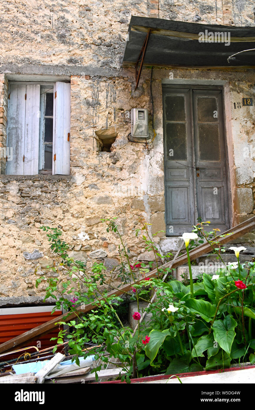 Simple stone cottage in Corfu village Stock Photo - Alamy