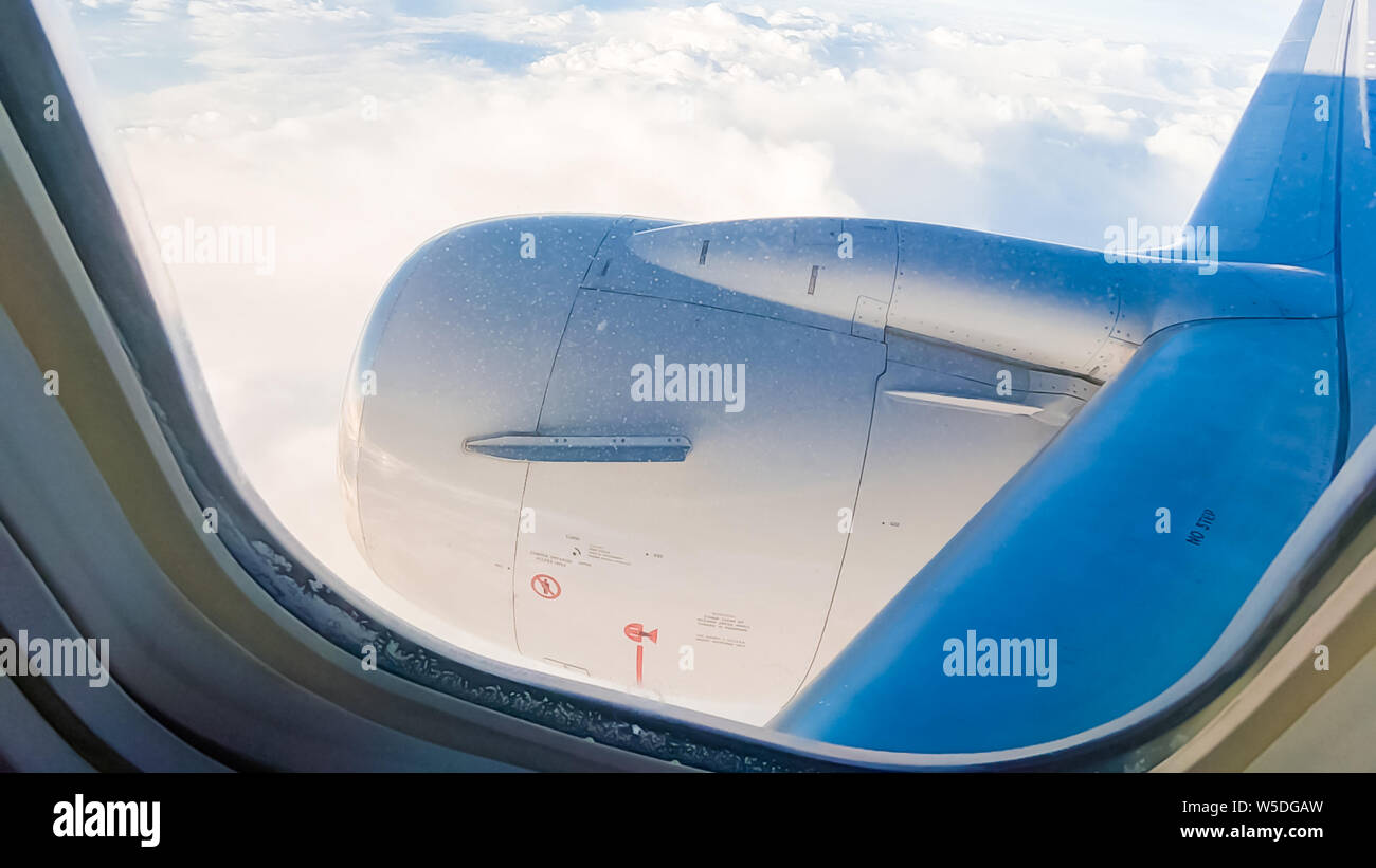 View from the window seat of commercial passenger airplane Stock Photo ...