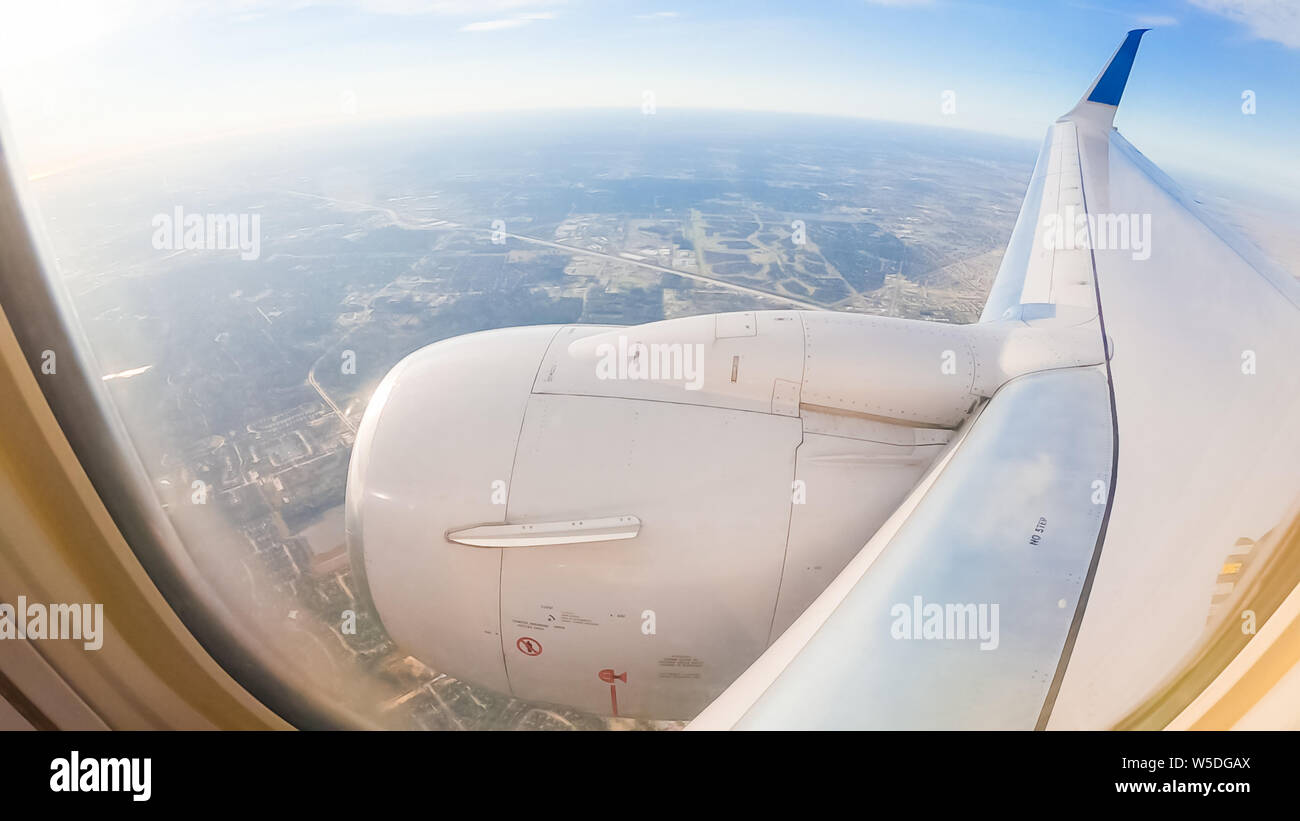 View from the window seat of commercial passenger airplane Stock Photo ...