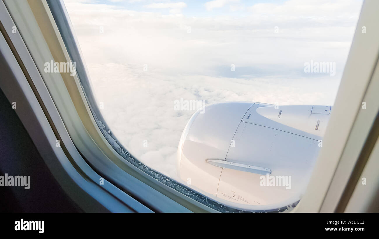 View from the window seat of commercial passenger airplane Stock Photo ...