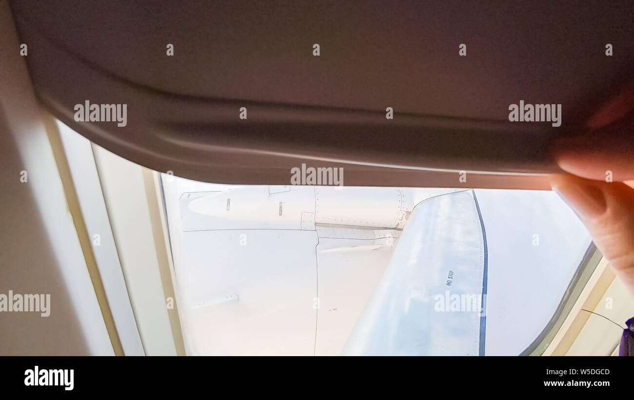 View from the window seat of commercial passenger airplane Stock Photo ...