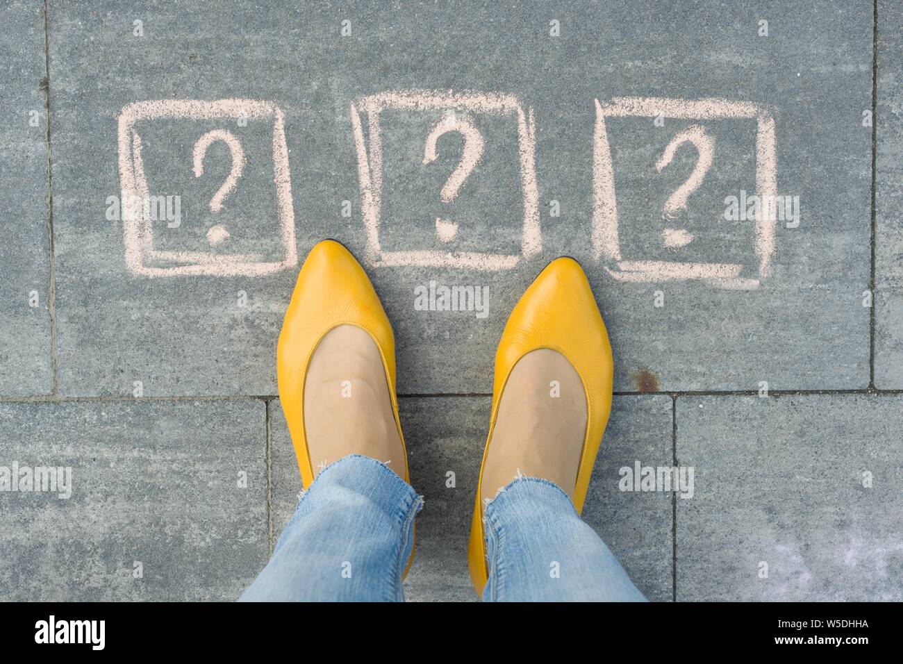 Woman thinking question marks hi-res stock photography and images - Alamy