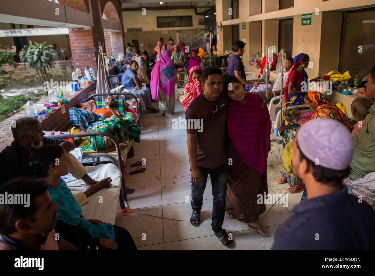 DHAKA, BANGLADESH - JULY 28 : Dengue fever patient receives treatment ...