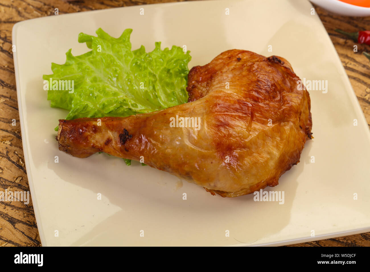 Crispy tasty Roasted chicken leg Stock Photo - Alamy
