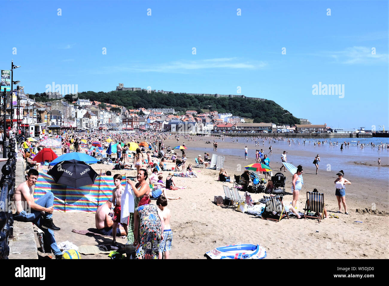 Scarborough beach deckchairs hi-res stock photography and images - Alamy