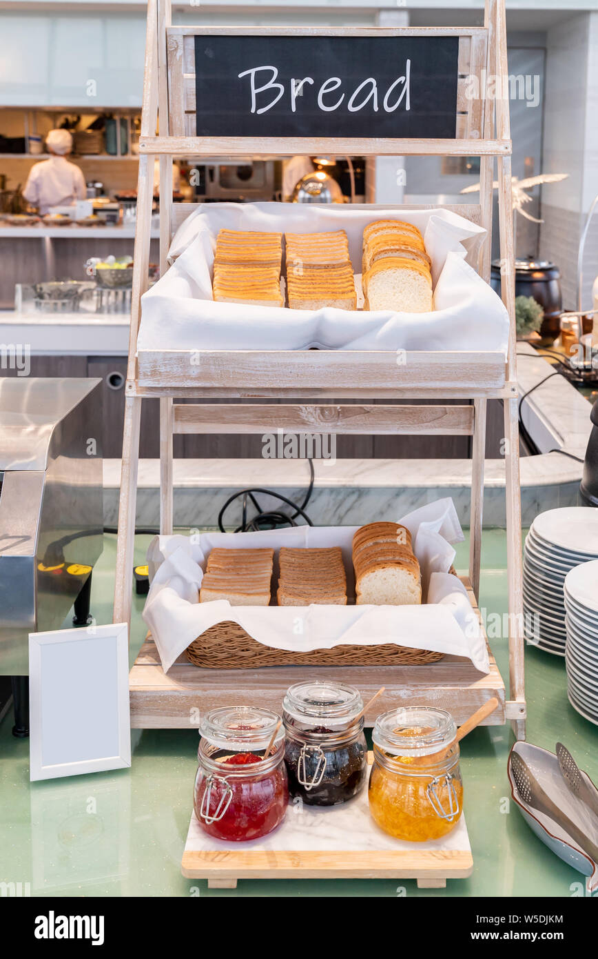 variety of bakery bread and rolls station in buffet line Stock Photo ...