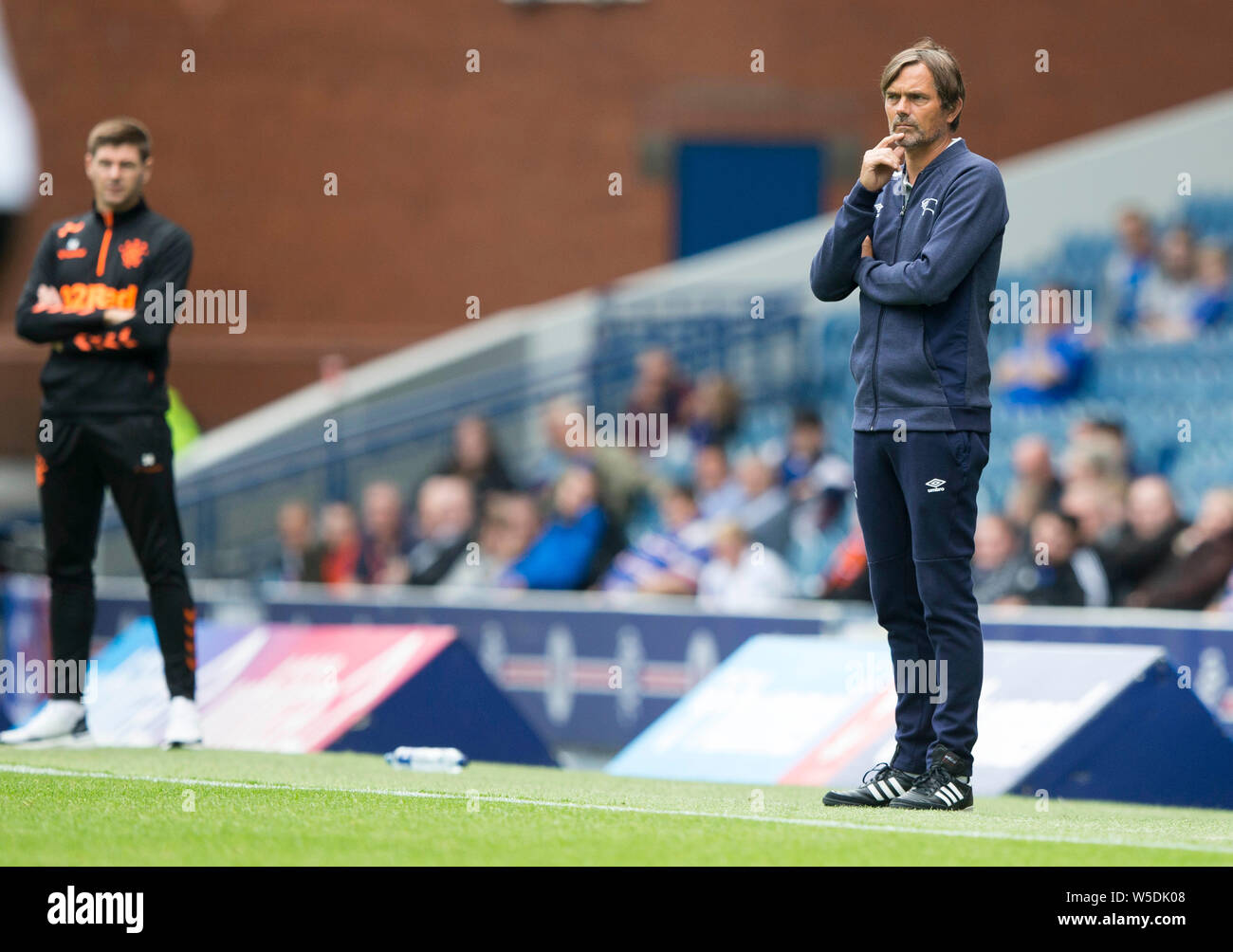 Derby County manager Phillip Cocu (right) and Rangers Steven Gerrard ...